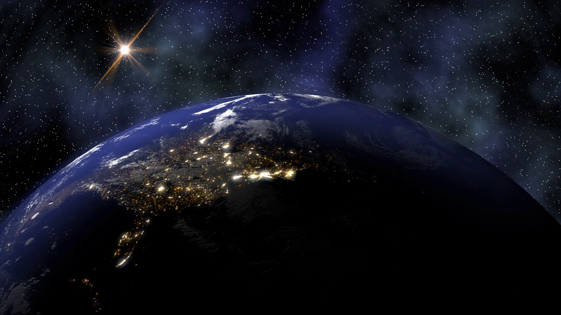 Planet Earth rotates in space from day into night and city lights turn ...