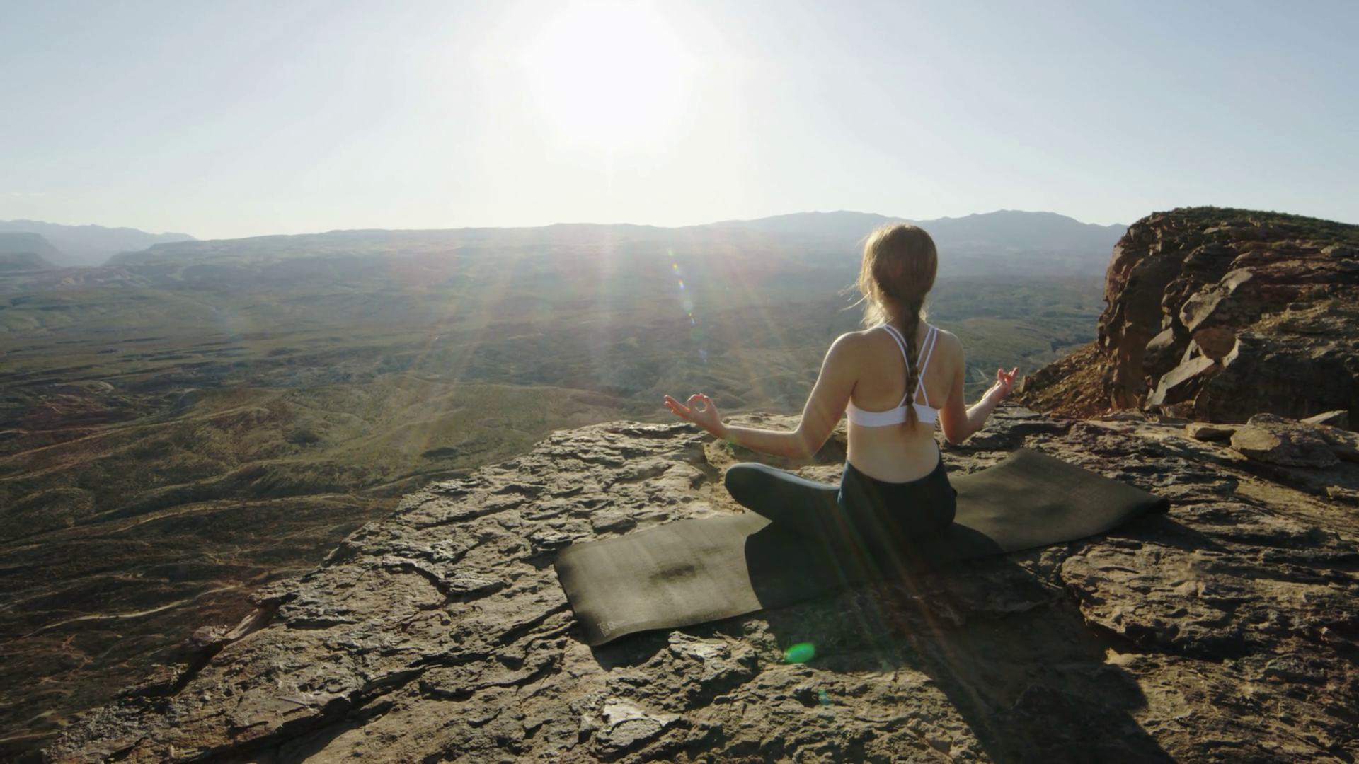 medium shot of woman doing yoga in the desert Stock Video Footage ...