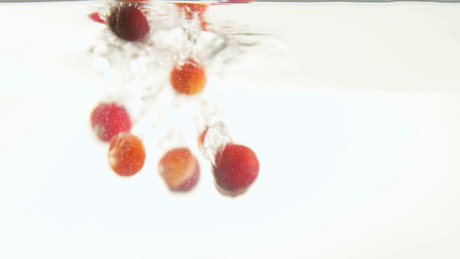 Slow Motion Of Cranberries Falling Into Water Stock Footage SBV ...