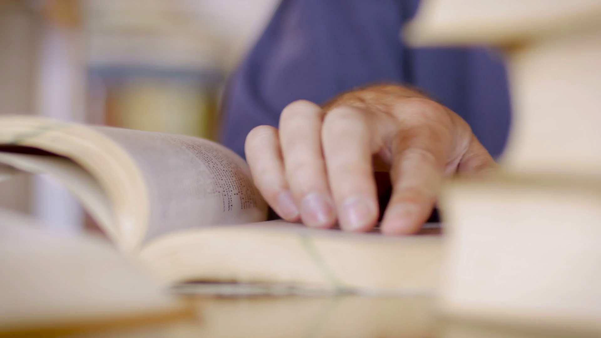 Close Up Of Man's Hand Scanning Book Reads Stock Footage SBV-308726577 ...