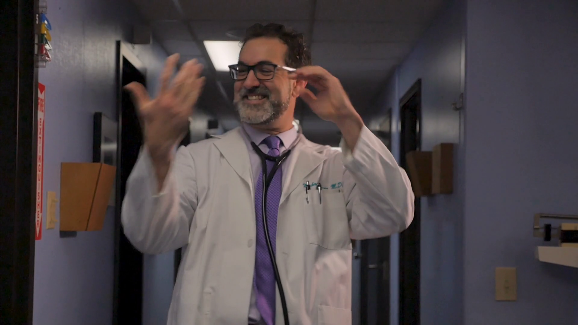 Male Doctor Giving High Five Fist Bump Stock Footage SBV-332582131 ...