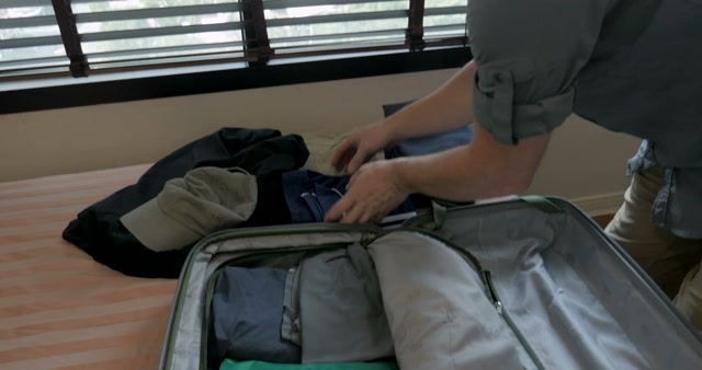 Man Packing Suitcase Stock Footage: Royalty-Free Video Clips - Storyblocks
