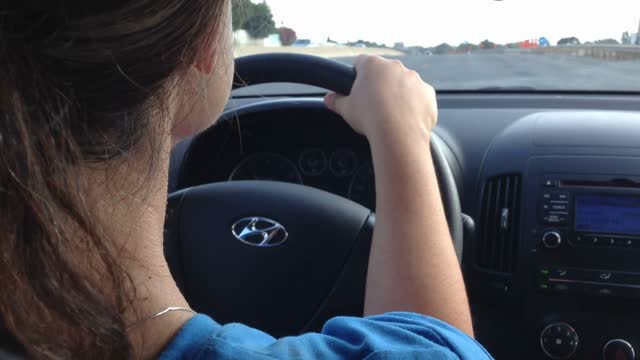 Woman Driving Car Legs Stock Footage: Royalty-Free Video Clips ...