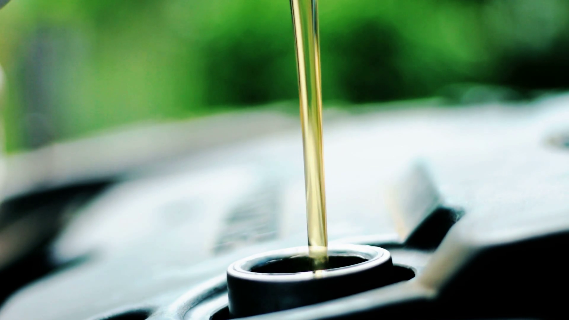 Fresh motor oil pouring into a car engine Stock Video Footage - Storyblocks