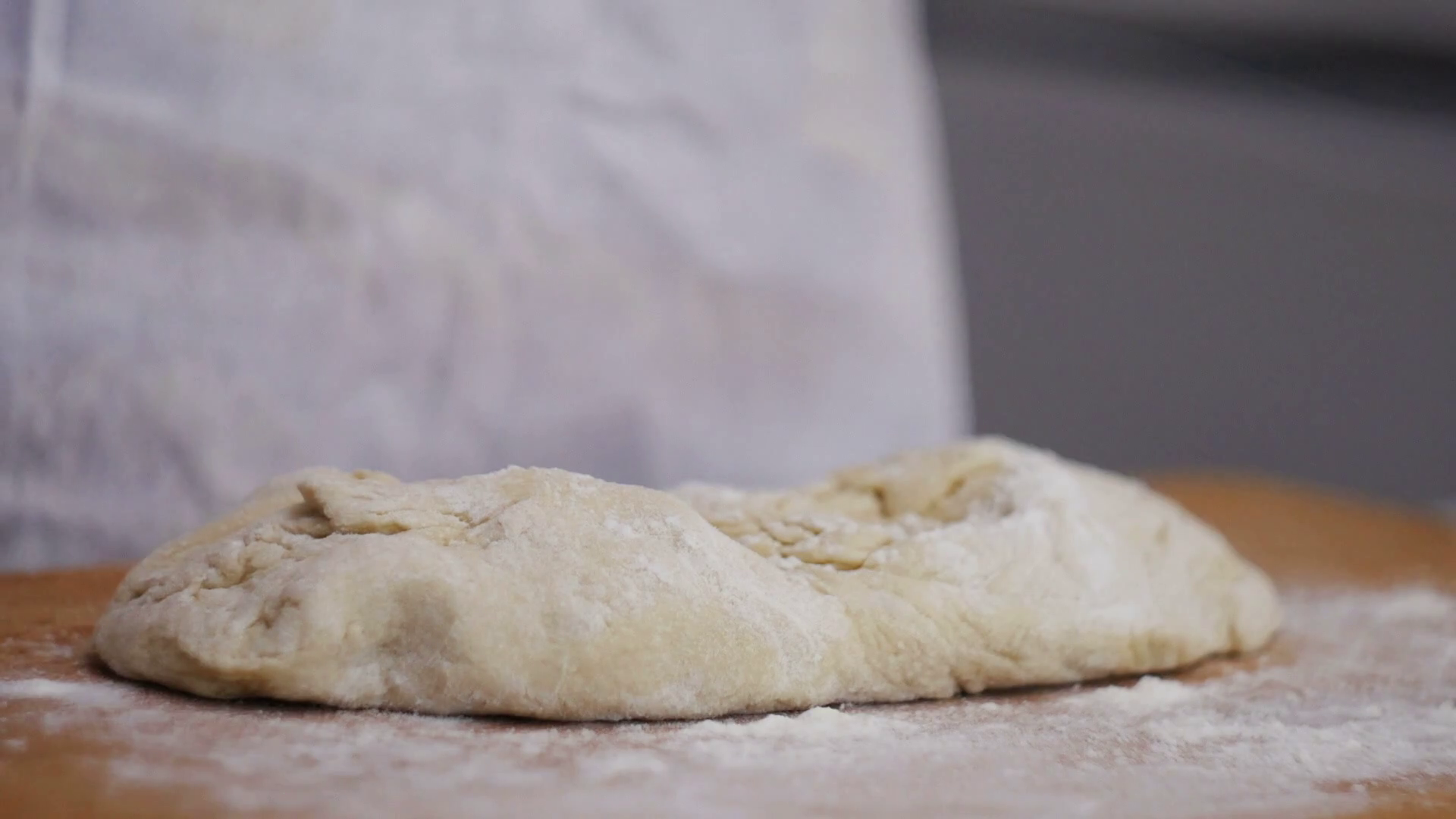 Baker Kneading Dough In Flour On Table Near Stock Footage SBV-320599185 ...