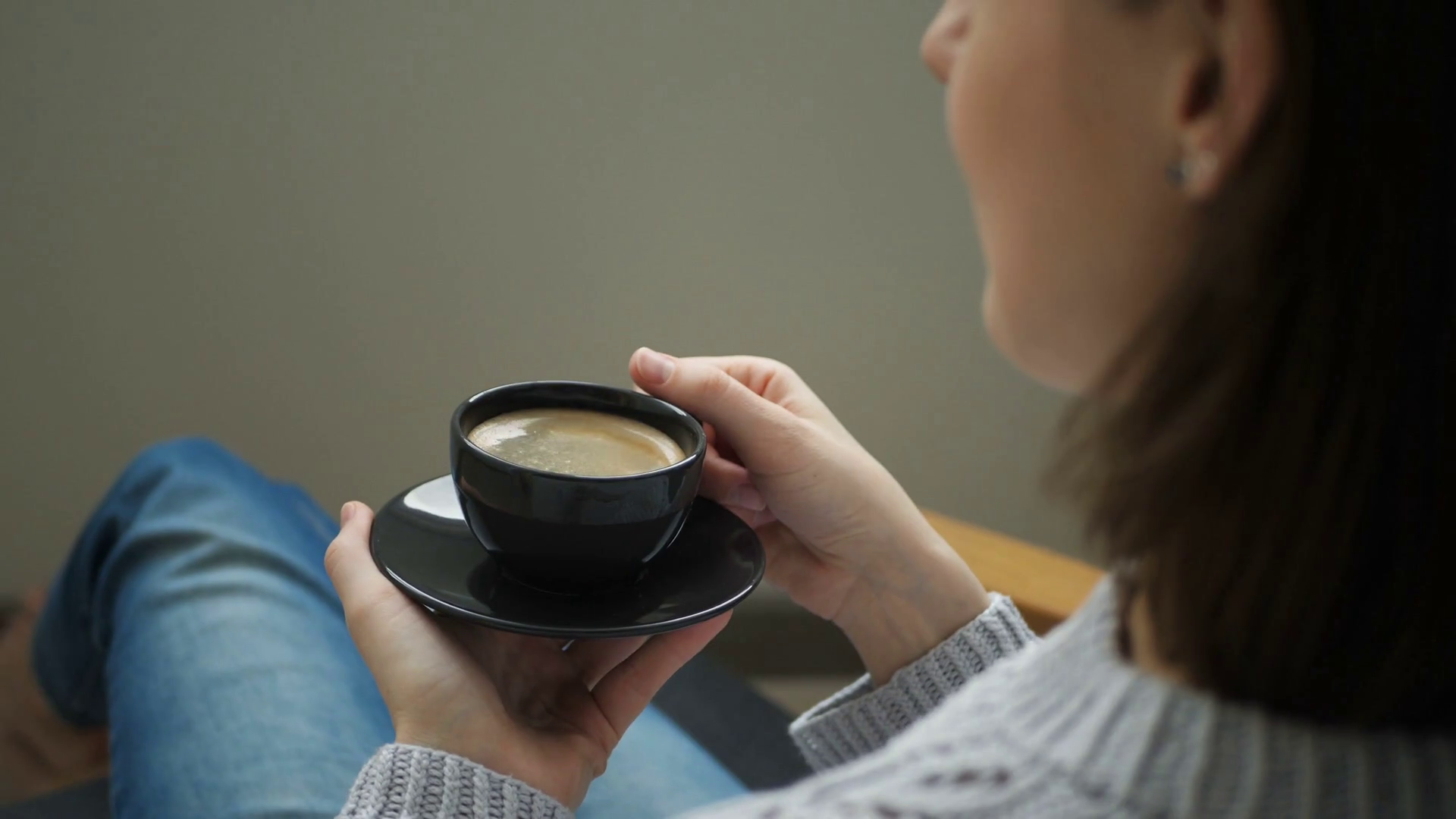 woman drinking coffee in the morning sitting in a chair Stock Video ...
