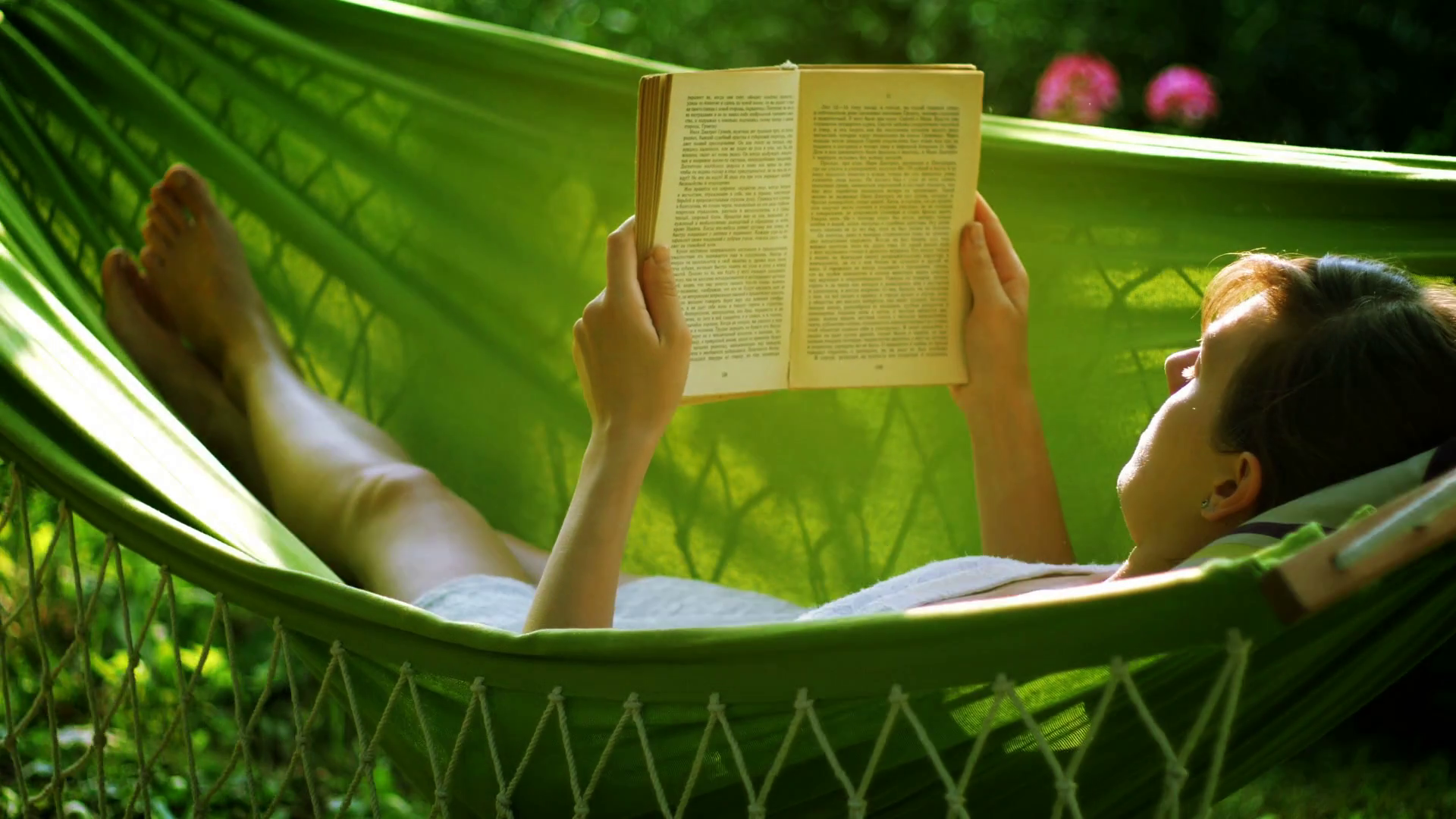 Woman Reading Book On Backyard Hammock Stock Footage SBV-309900569 ...