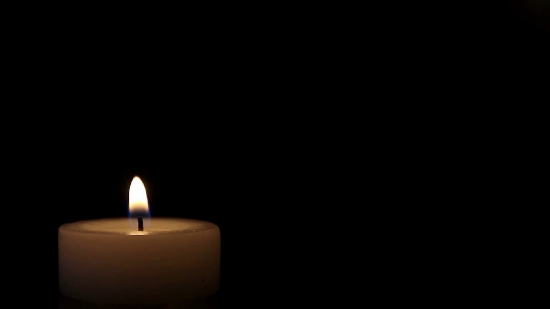 A Candle Burning Isolated On Black Background Stock Footage SBV ...
