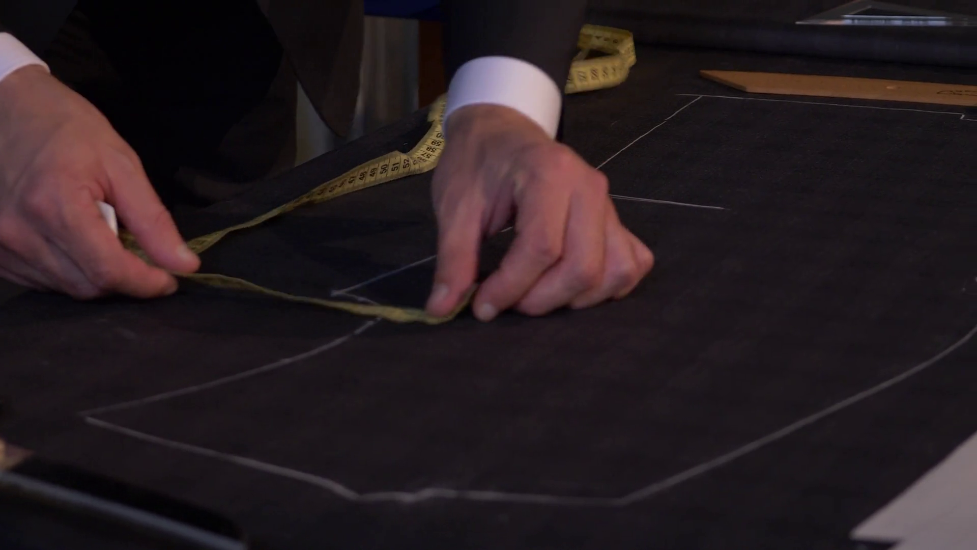 A Tailor Is Drawing Lines On Fabric With Stock Footage SBV-337754956 ...