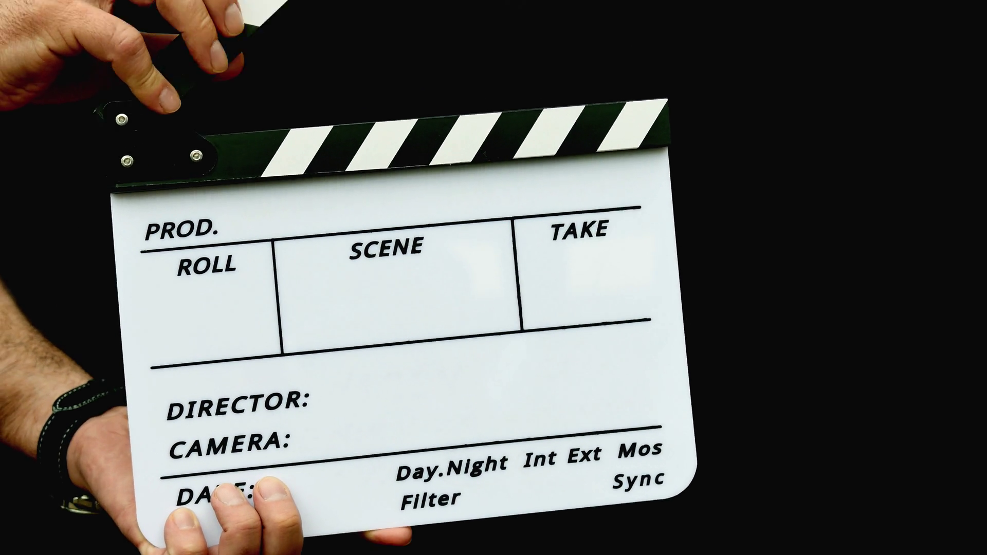 Footage of a person using a clapper board isolated on a black ...
