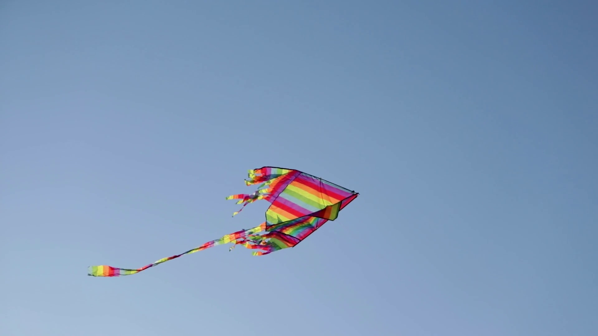 Slow Motion Footage Of Kite Flying Over Blue Stock Footage SBV ...