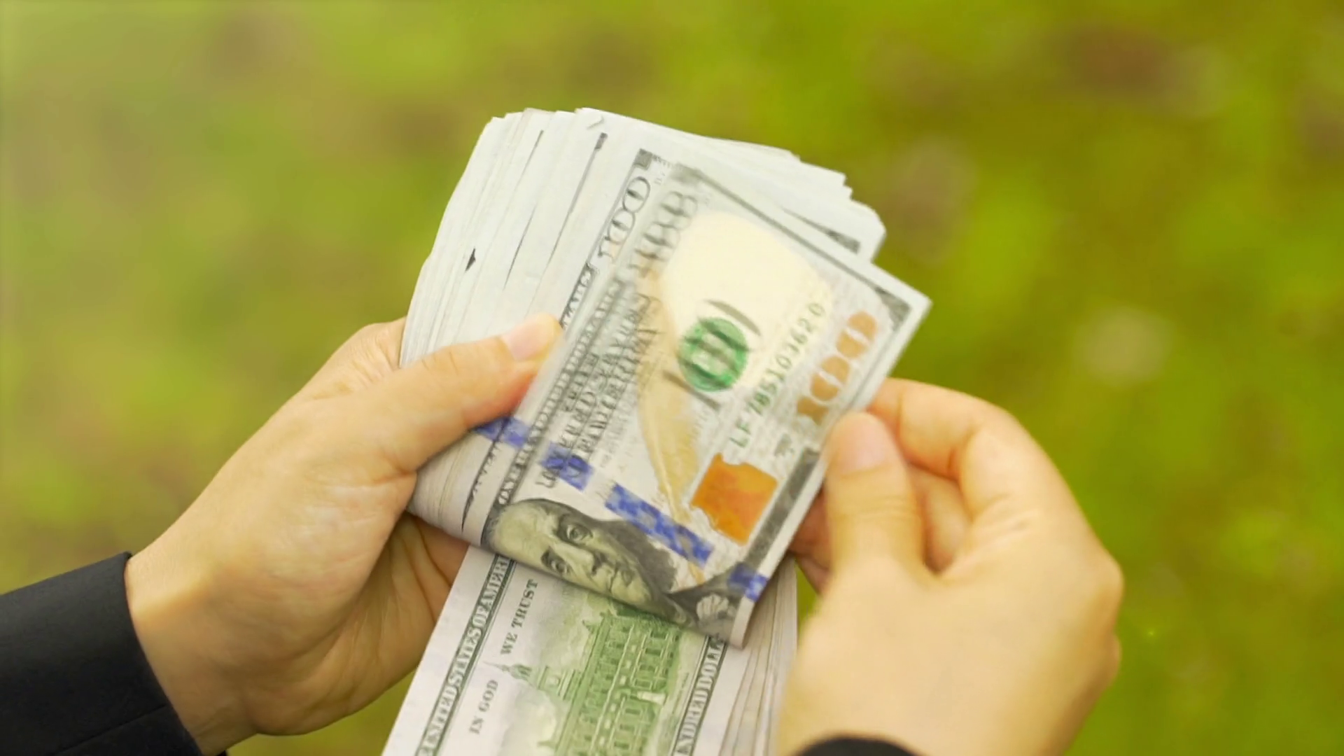 Person Counting Stack Of 100 Dollar Bills Stock Footage SBV 301622221
