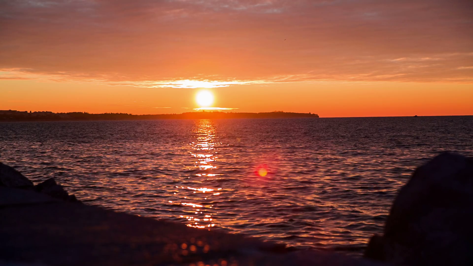 Beautiful sunset at sea with colorful sky and sea.Wide shot from pier ...