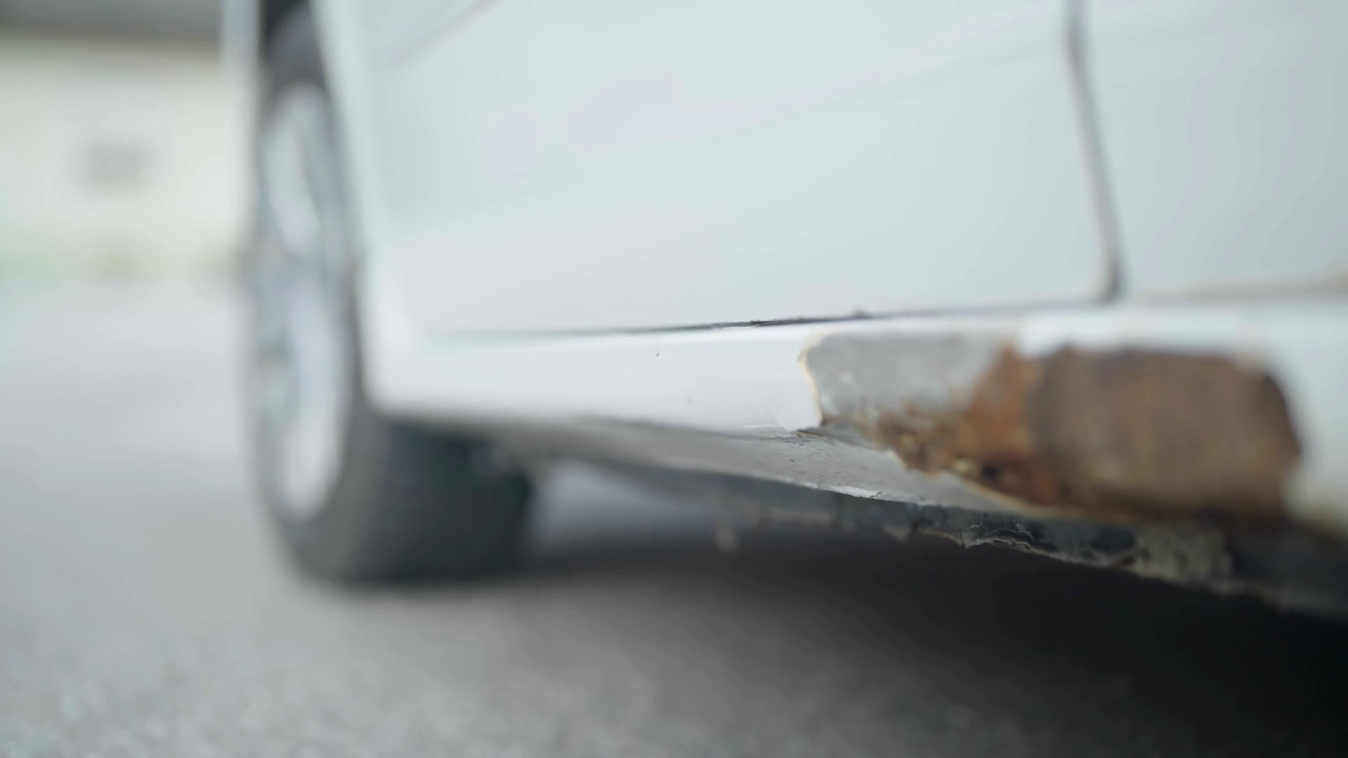Reveal Of Rusted Hidden Damage On White Car Stock Footage SBV-348724610 ...