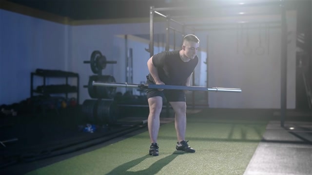 Woman Performing Barbell Row Exercise Stock Footage: Royalty-Free Video ...