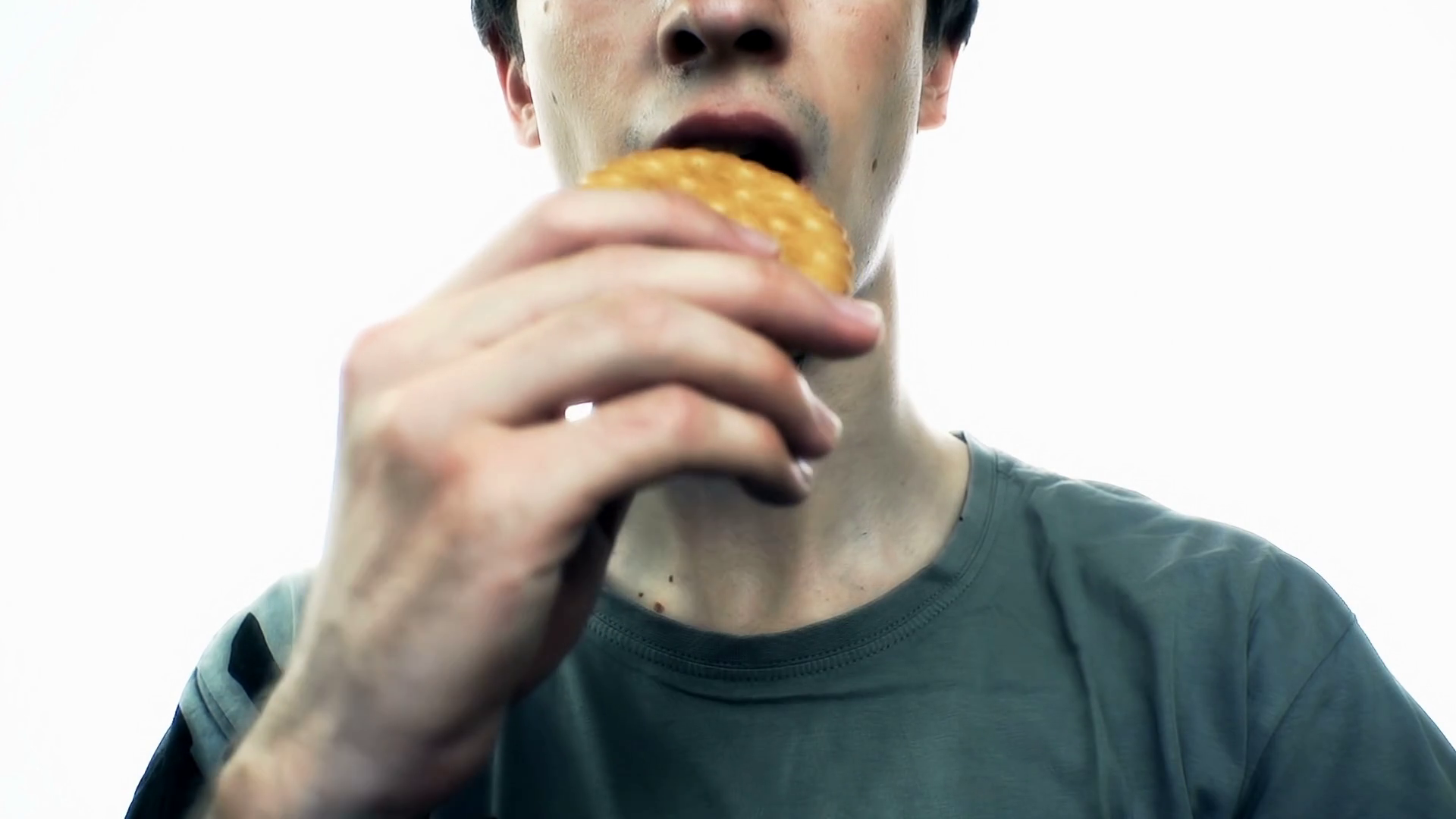 Man Eating Cookie In Slow Motion Stock Footage SBV-316175674 - Storyblocks