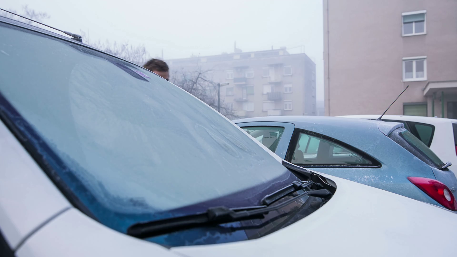 Man Scratching Ice From Windshield Wide Shot Stock Footage SBV ...