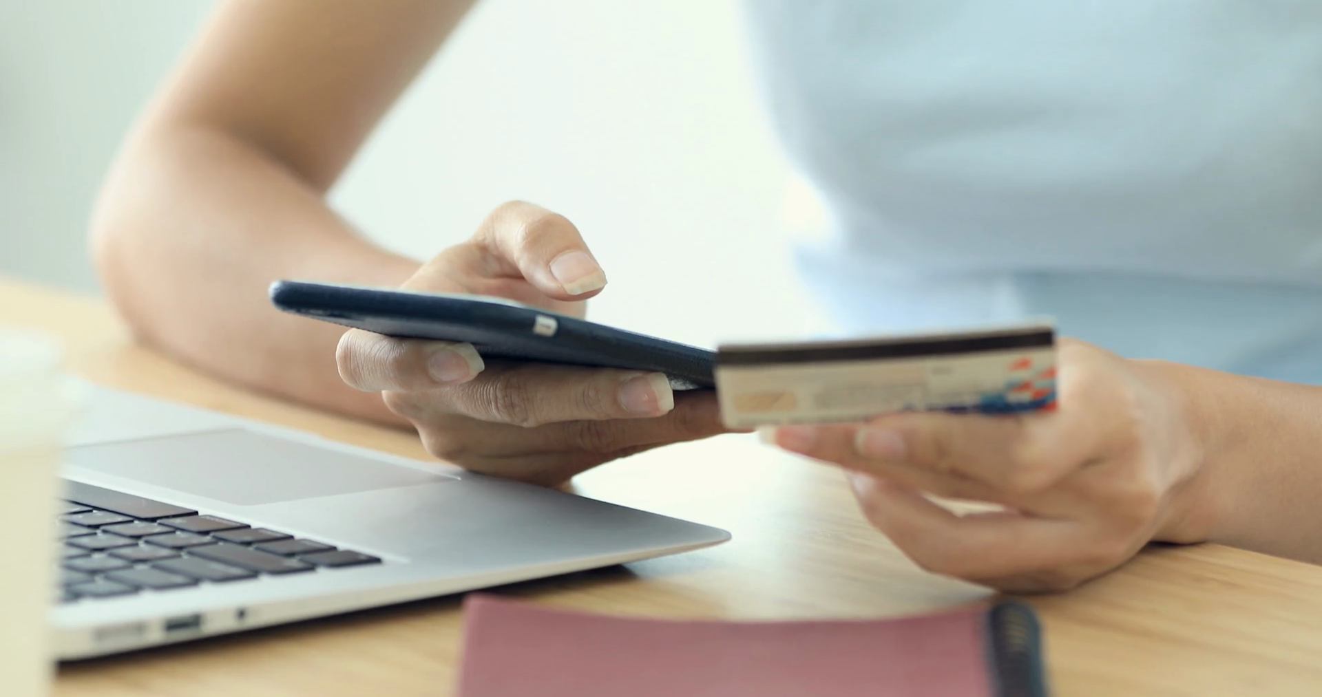 Online shopping. Young caucasian hands buying goods from the internet ...