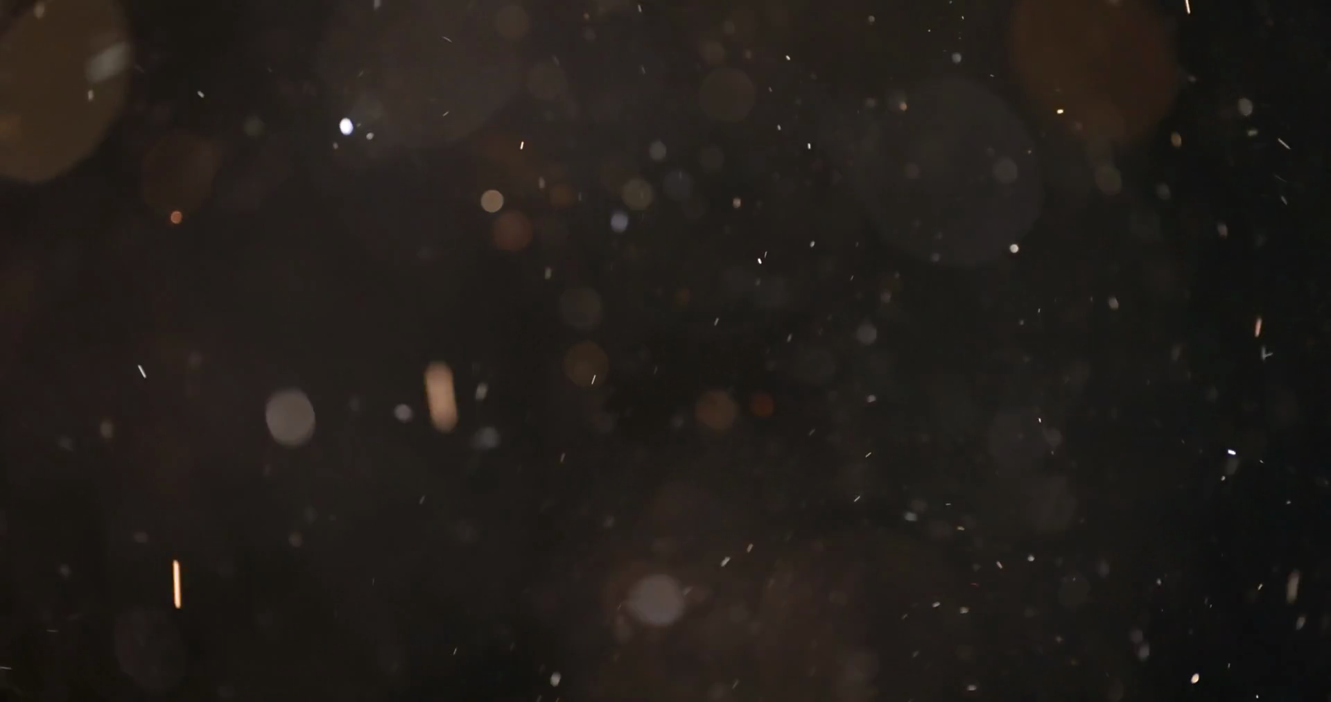 Floating abstract particle bokeh on dark background Stock Video Footage ...