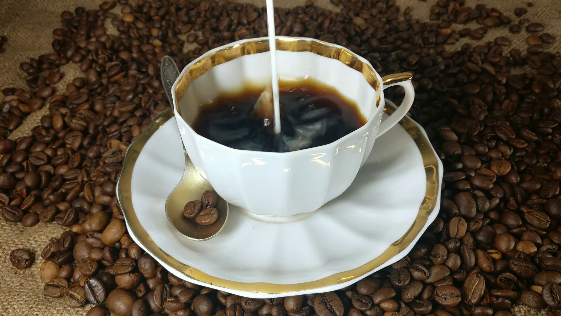 Pouring Milk Into Cup Of Fresh Brewed Coffee Stock Footage SBV