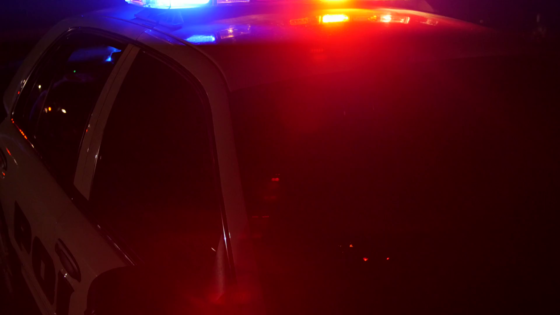 Bright police car lights at an accident scene at night Stock Video ...