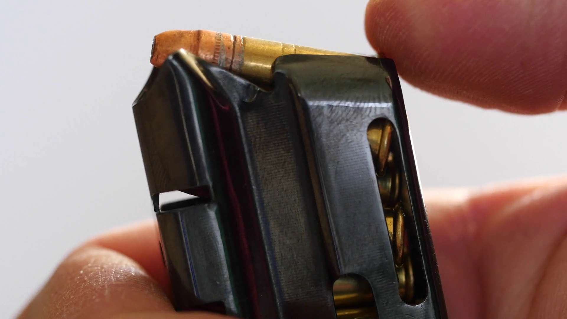 Closeup Man Unloads Bullets From Magazine Stock Footage SBV-303921298 ...