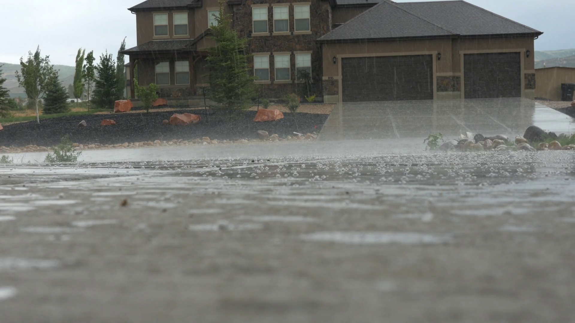 Hailstones Falling On Driveway Stock Footage SBV-303332332 - Storyblocks