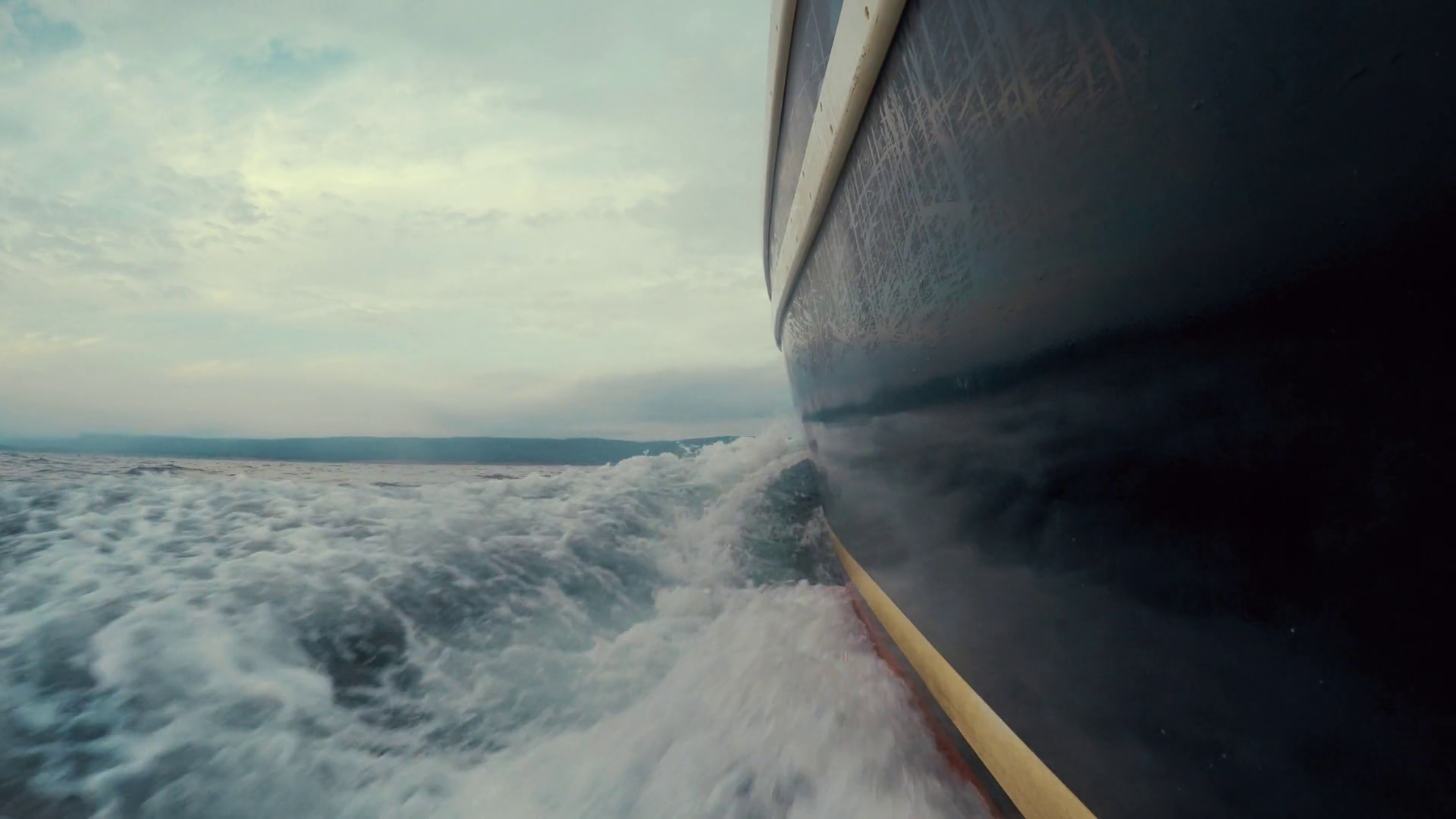 Low Shot Of Wake Large Fishing Boat In Ocean Stock Footage SBV ...