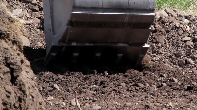 Tractor Digging A Hole Stock Footage: Royalty-Free Video Clips ...