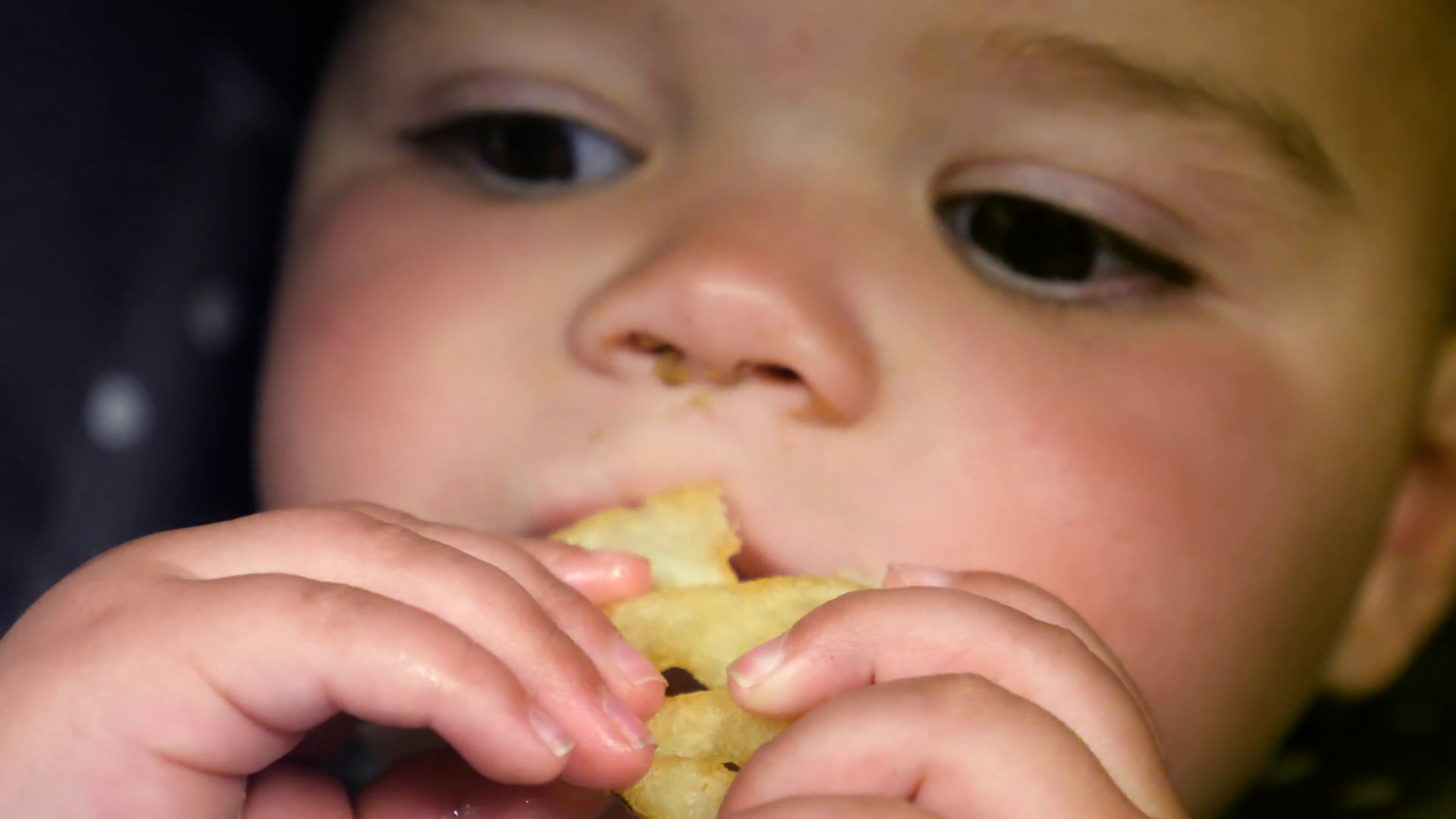 A Baby Girl Eats French Fry Sitting In Car Stock Footage SBV-337835093 ...