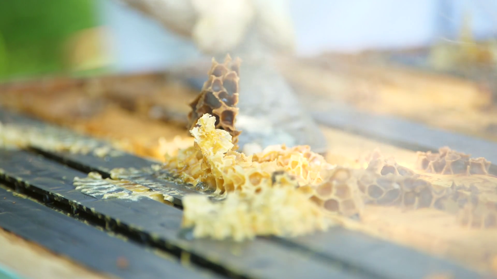 A Man Scraping Bees Wax Off Of Beehive Stock Footage SBV-326285517 ...