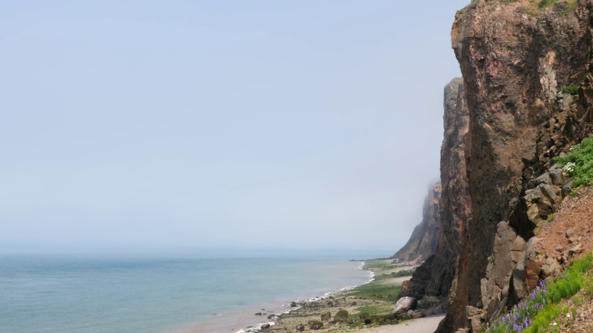 Cool Fog Blows Over Oceanside Cliffs In Nova Stock Footage SBV ...