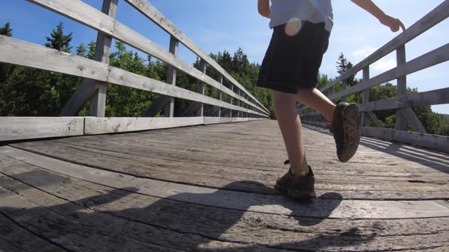 Walking On A Bridge Stock Footage: Royalty-Free Video Clips - Storyblocks
