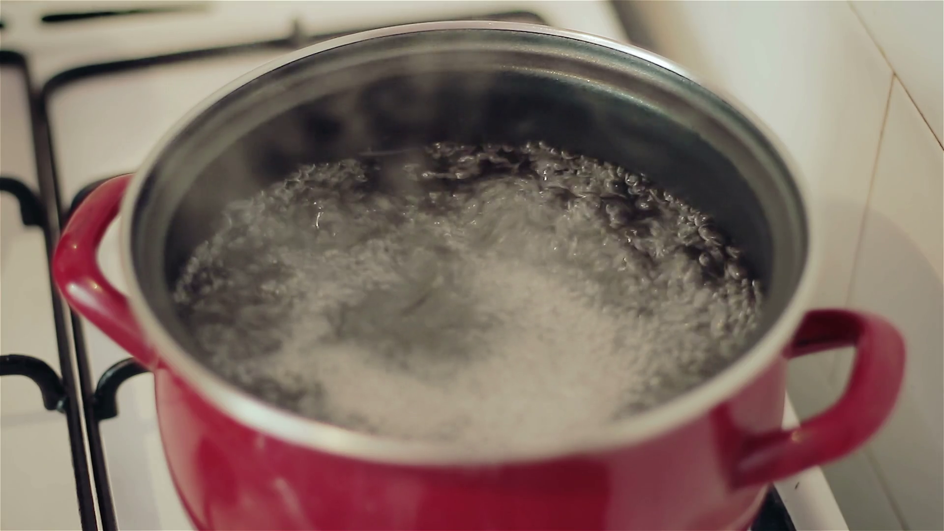 Red Pot On Gas Stove Stock Footage SBV-300915080 - Storyblocks