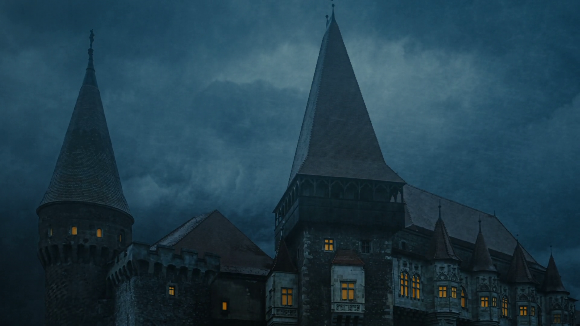 Corvin Castle in Transylvania on a stormy night - main towers Stock ...