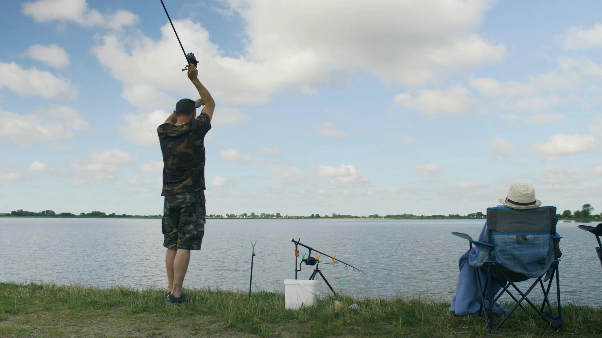 Fishing by a lake - long shot Stock Video Footage 00:20 SBV-338662096 ...