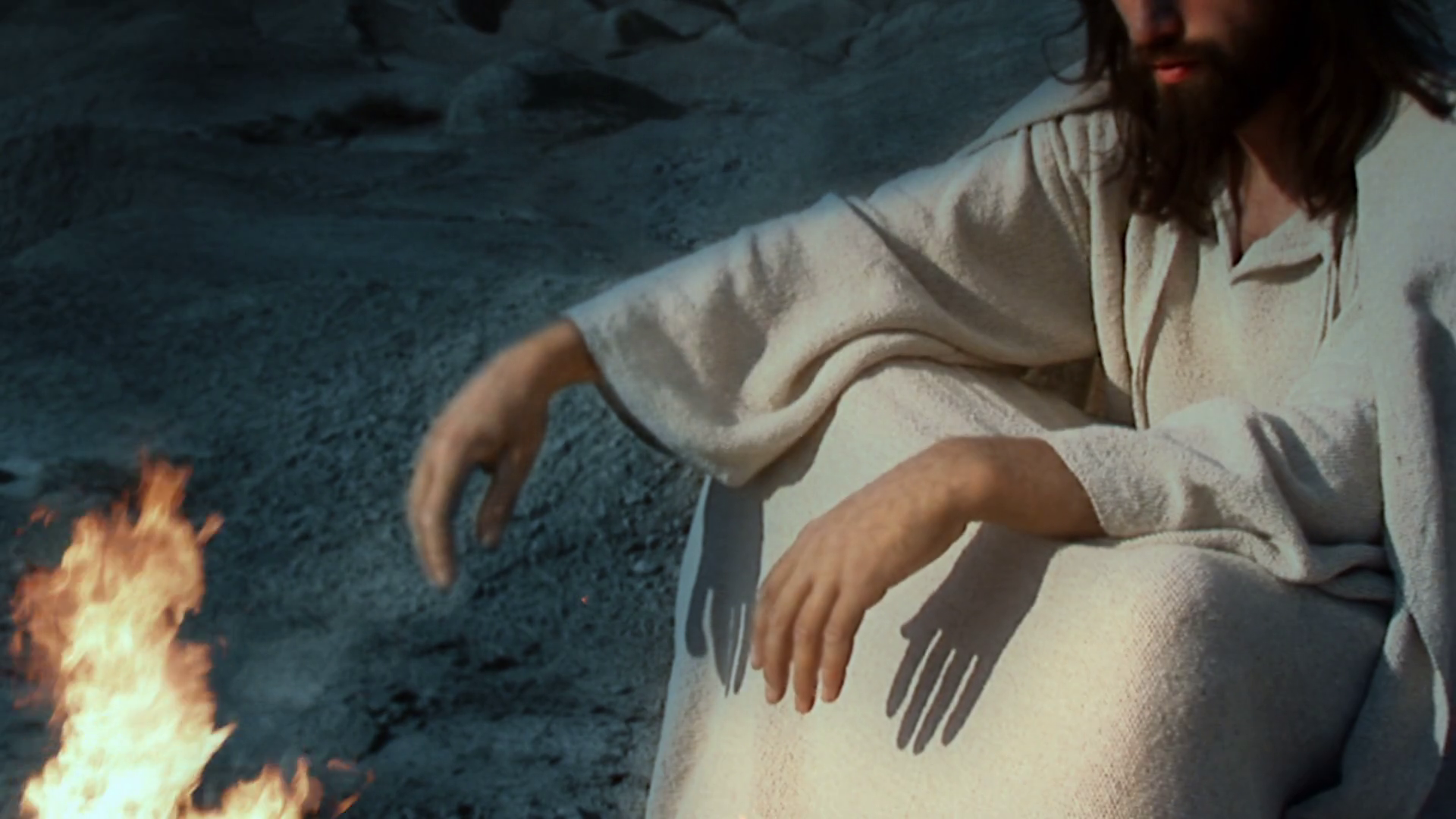 Jesus in the Wilderness and bonfire - CU Stock Video Footage - Storyblocks