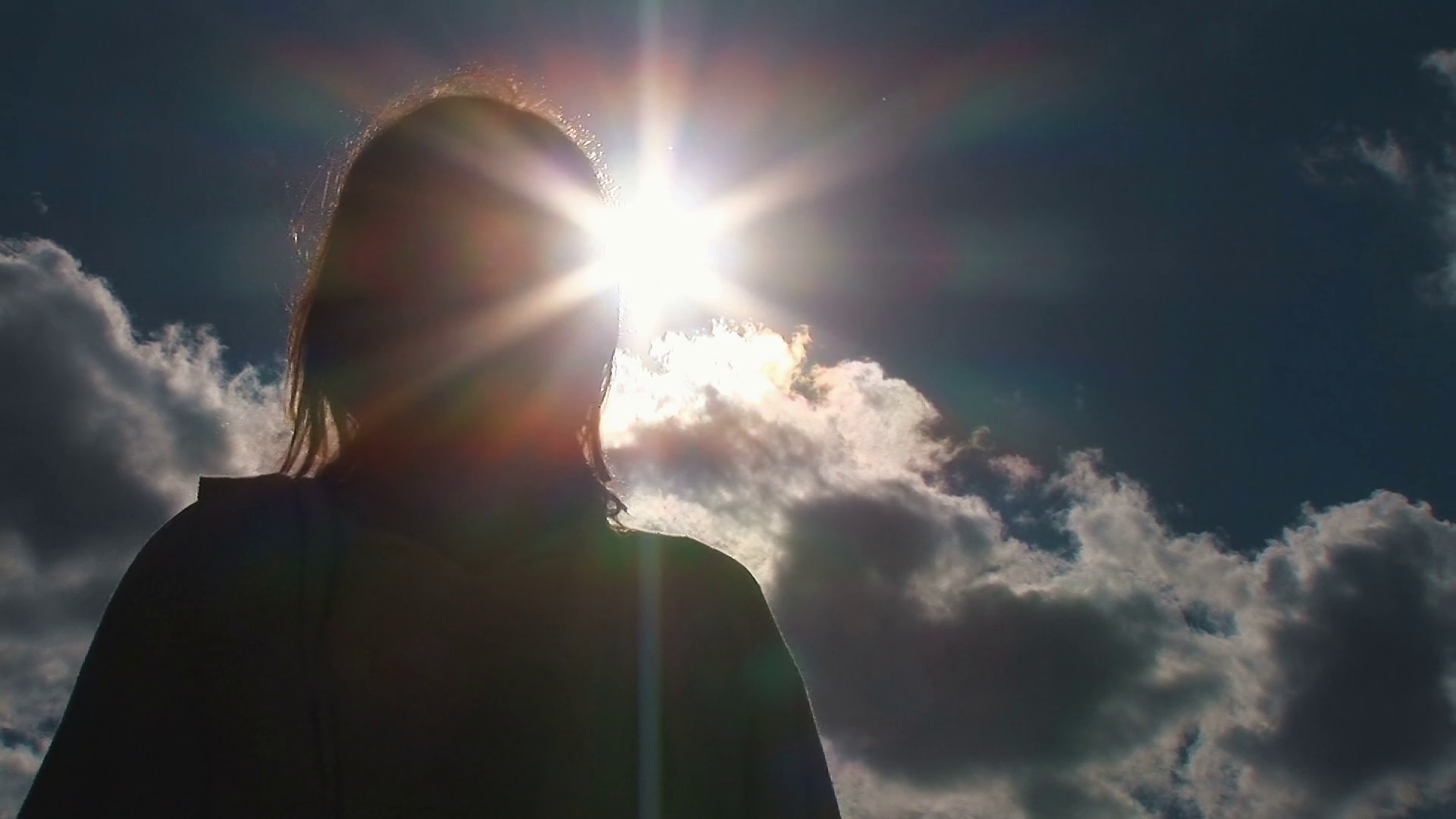 Silhouette of Christ and the Sun - CU Stock Video Footage - Storyblocks
