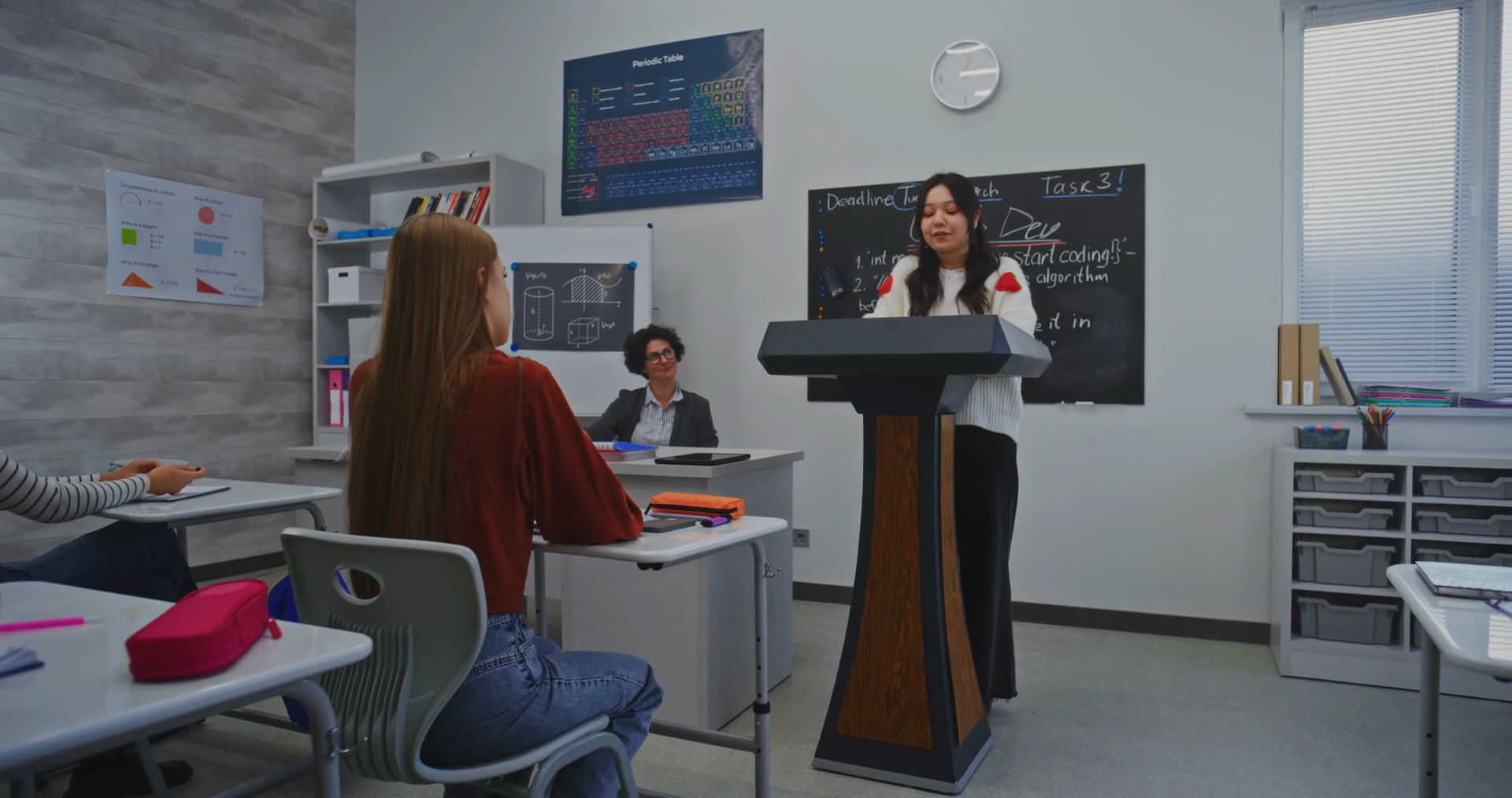 Young Woman Student Stands At Podium With Stock Footage SBV-353210379 ...