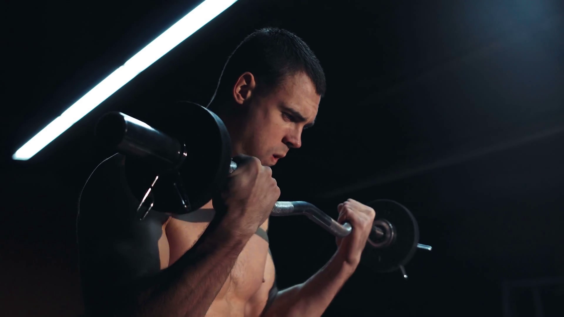 Muscular Man Doing Crossfit Training In Dark Stock Footage SBV ...