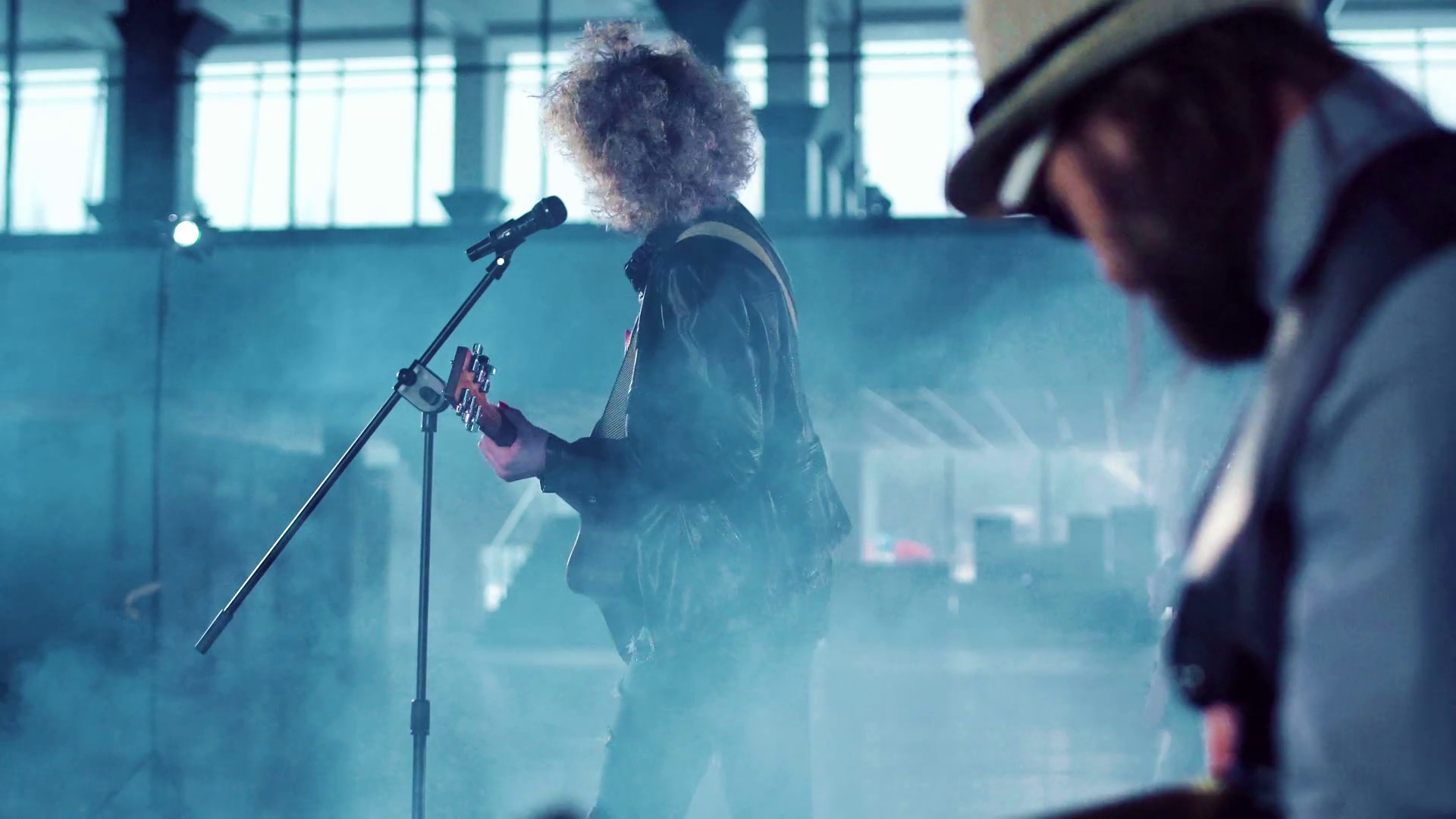 Curly-haired Lead Singer Performs In Empty Stock Footage SBV-312734278 ...