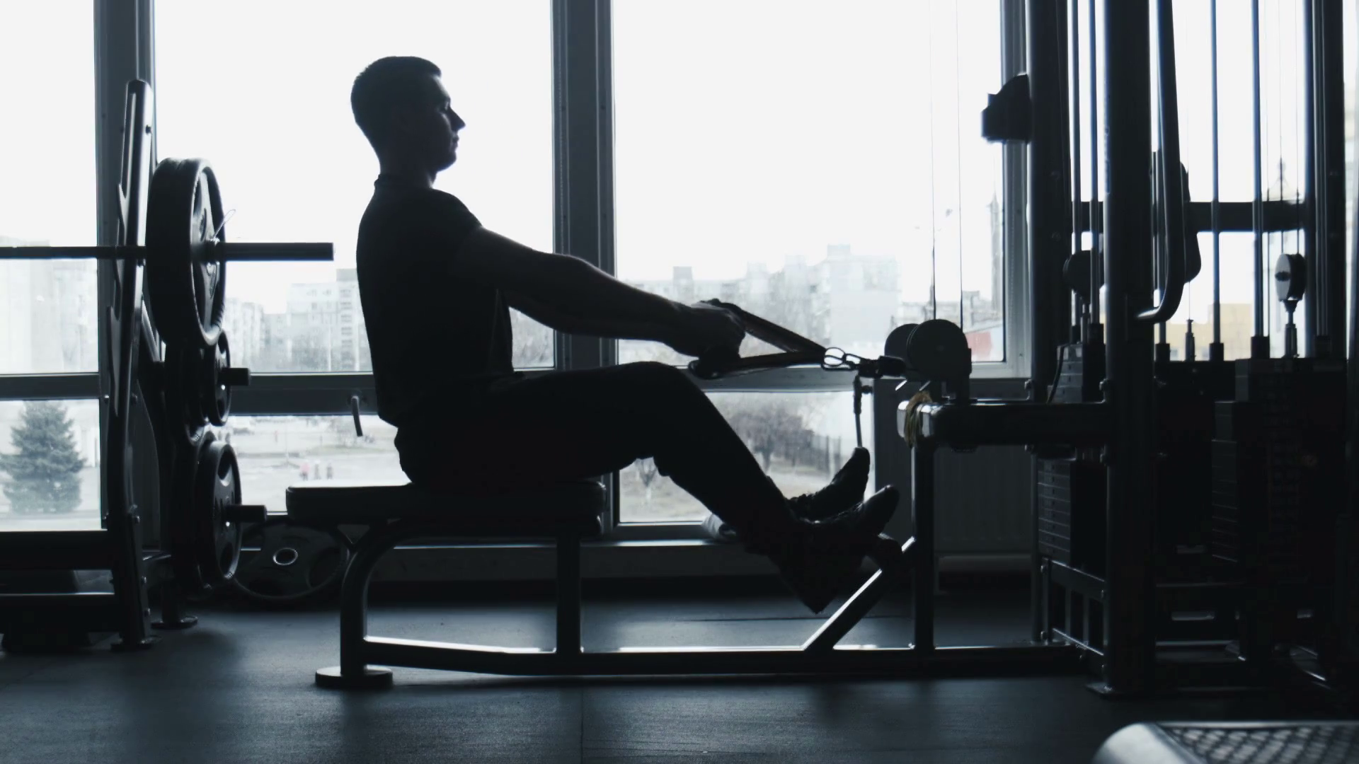 The Guy Does Exercises On Exercise Machine Stock Footage SBV-304358585 ...