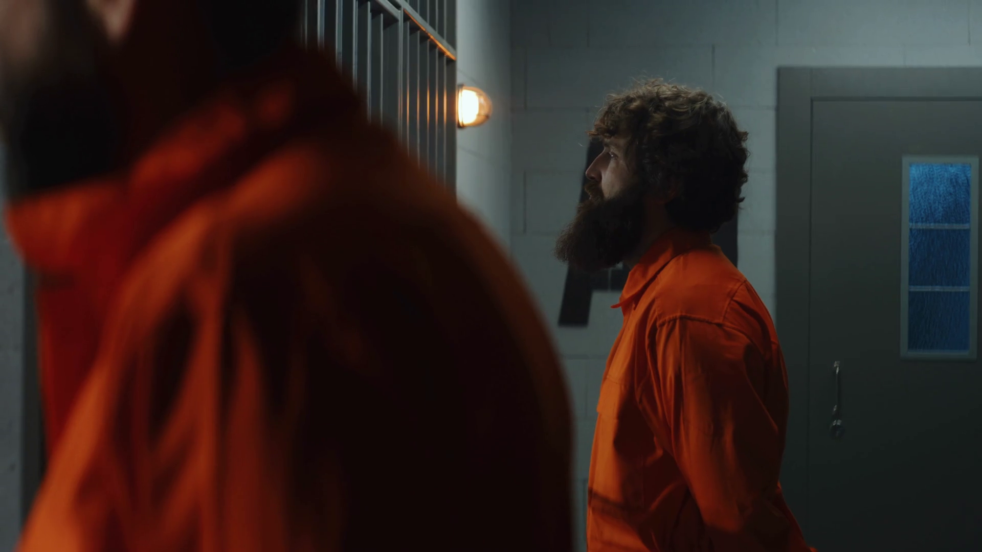 Two Prisoners In Orange Uniforms Stand Stock Footage SBV-347794432 ...