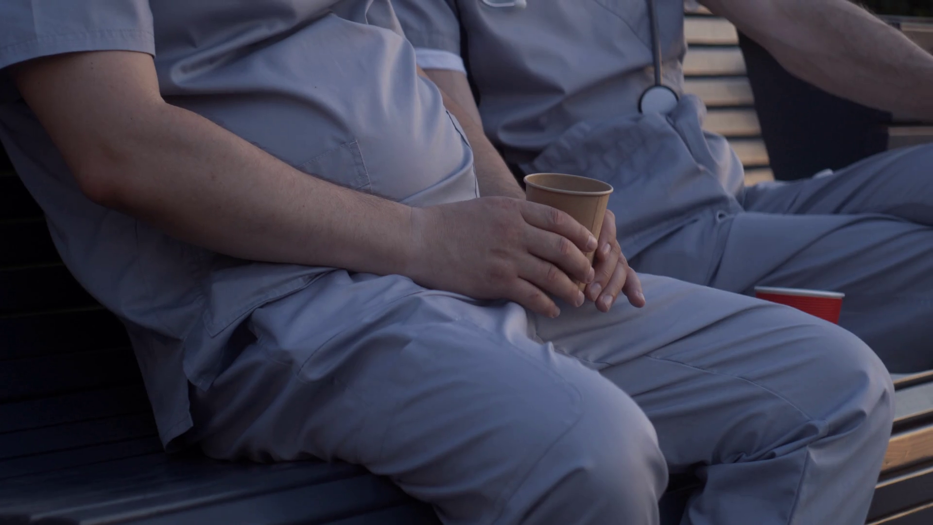 Two Doctors In Uniform Sit On Bench Near Stock Footage SBV-348466422 ...