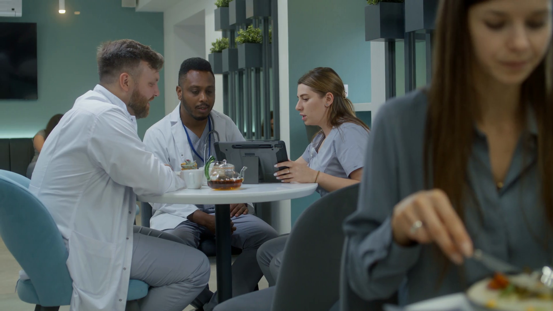 Multicultural Doctors Sit In Clinic Cafe Use Stock Footage SBV ...