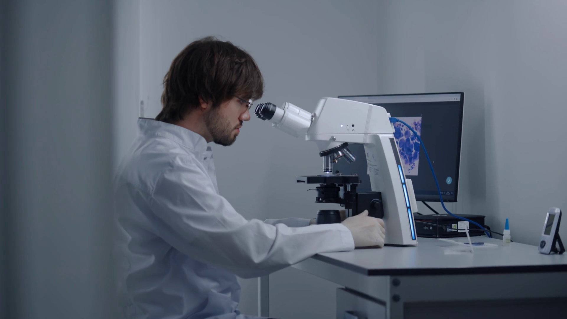 Side View Of Male Microbiologist Looking At Stock Footage SBV-348800877 ...