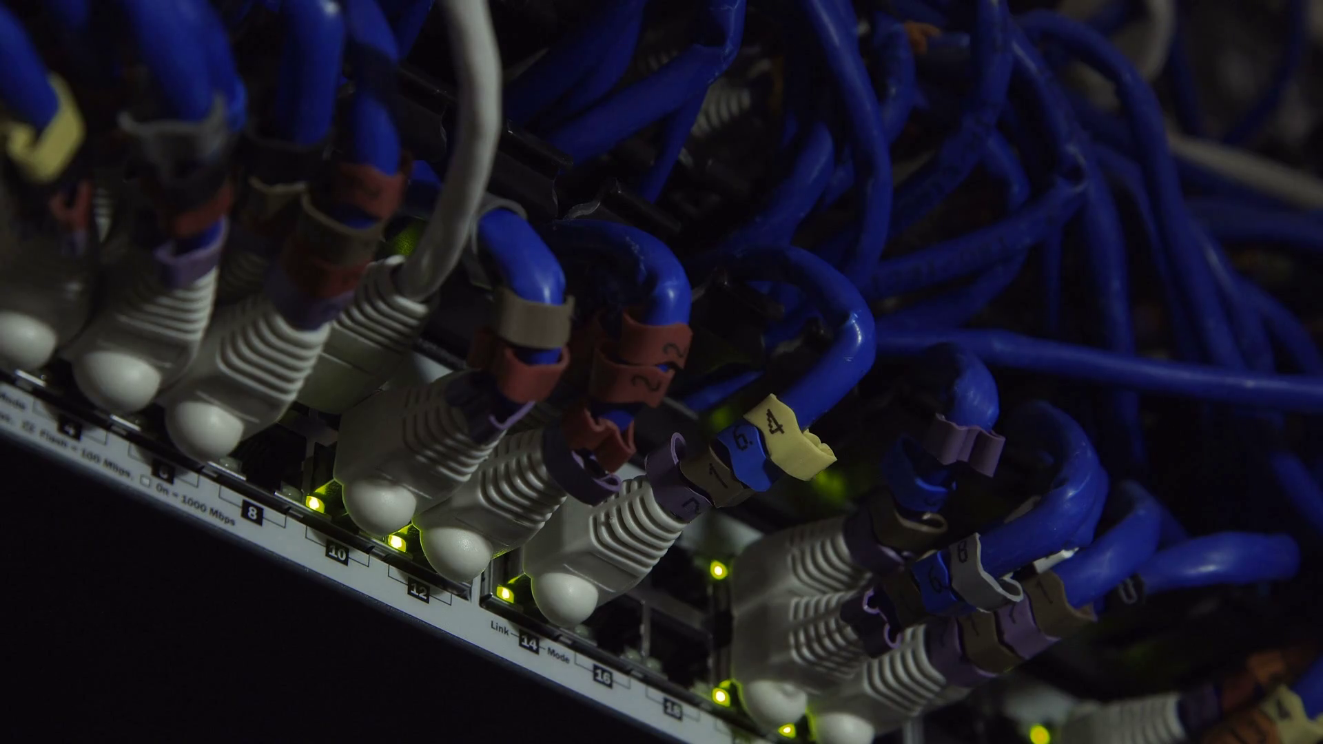 From below closeup view of glowing indicators of server hardware in ...