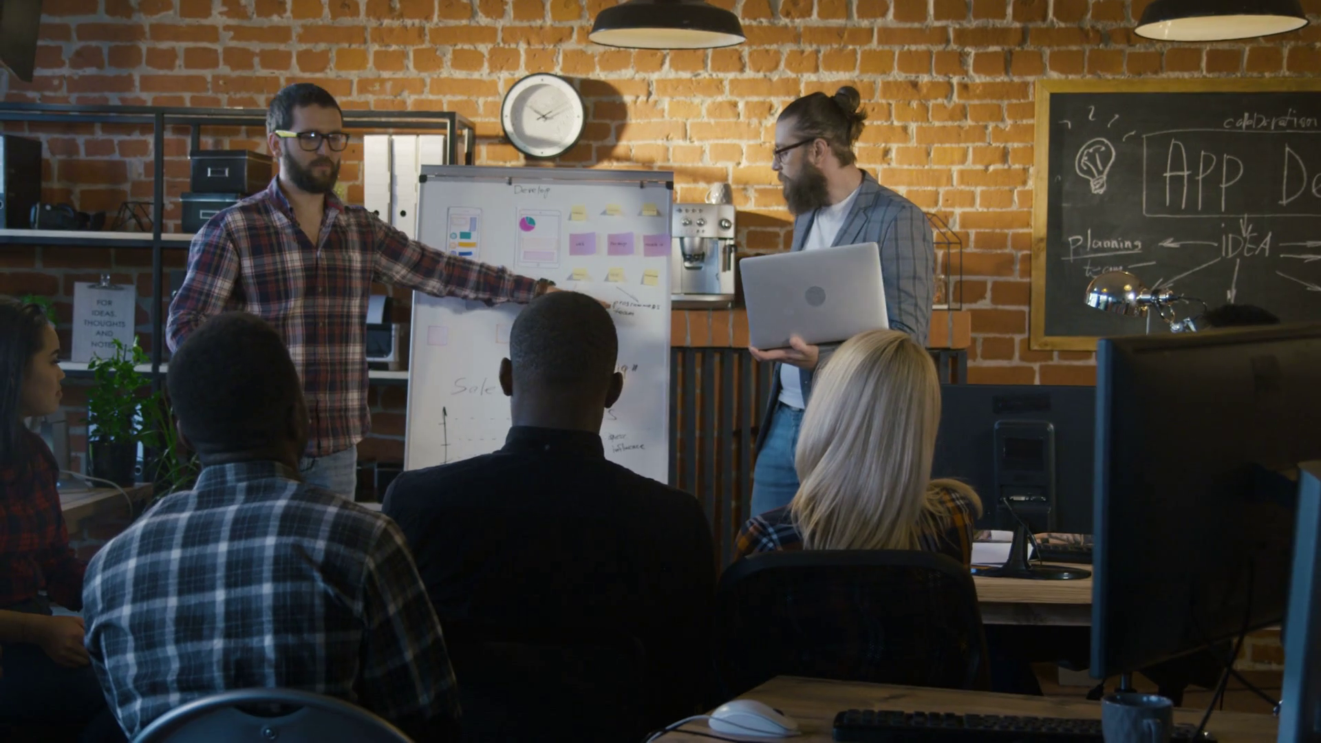 Group of IT specialist working together in office and creating ...