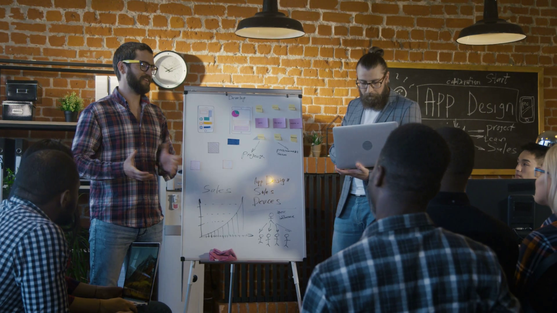 Group of IT specialist working together in office and creating ...