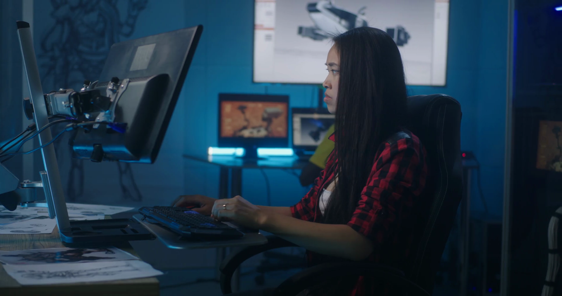 Medium shot of a female video game developer at work Stock Video ...